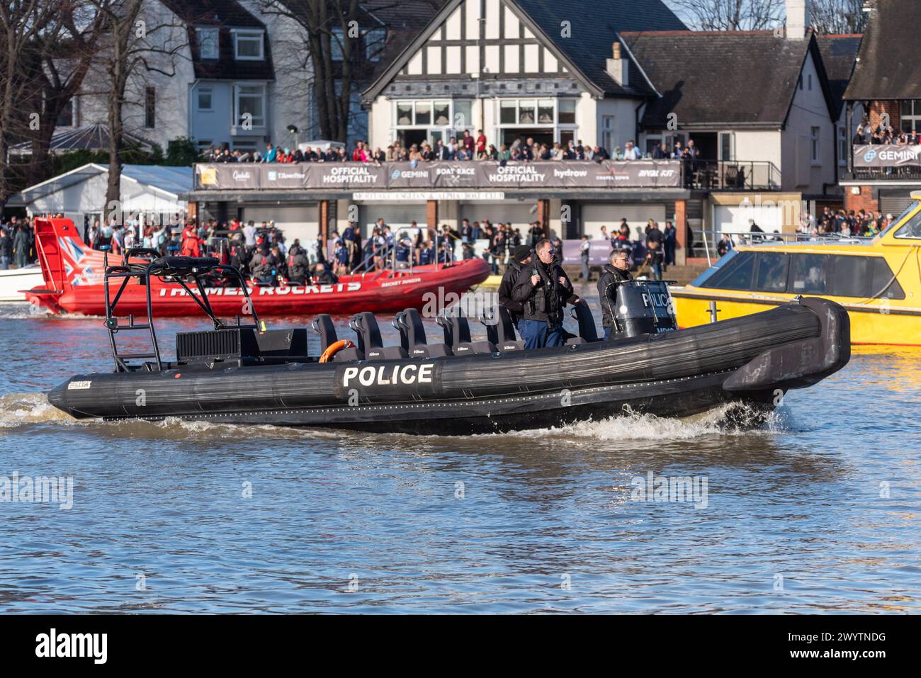 Police security vessel at the University Boat Race on the River Thames ...