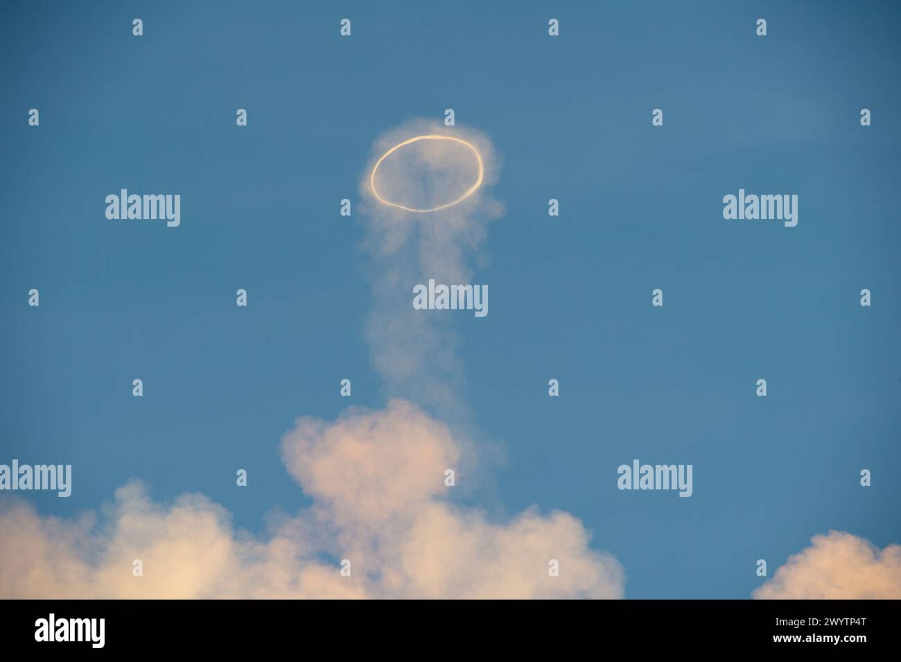 Etna, Italy. 06th Apr, 2024. A ring of gas in the sky Volcanic vortex ...