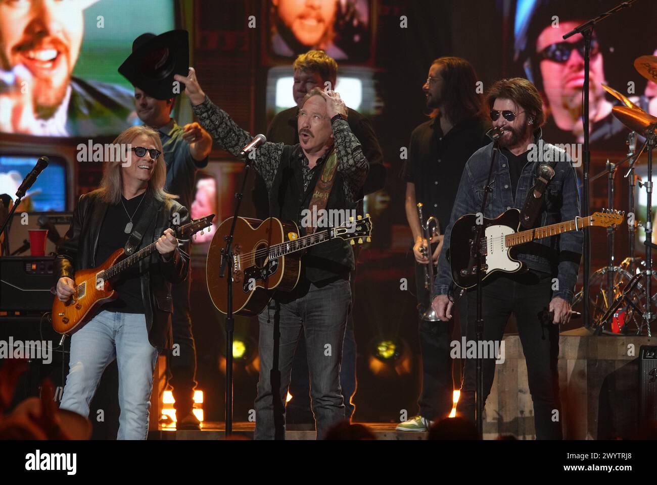 Kix Brooks and Ronnie Dunn of Brooks and Dunn perform onstage during ...
