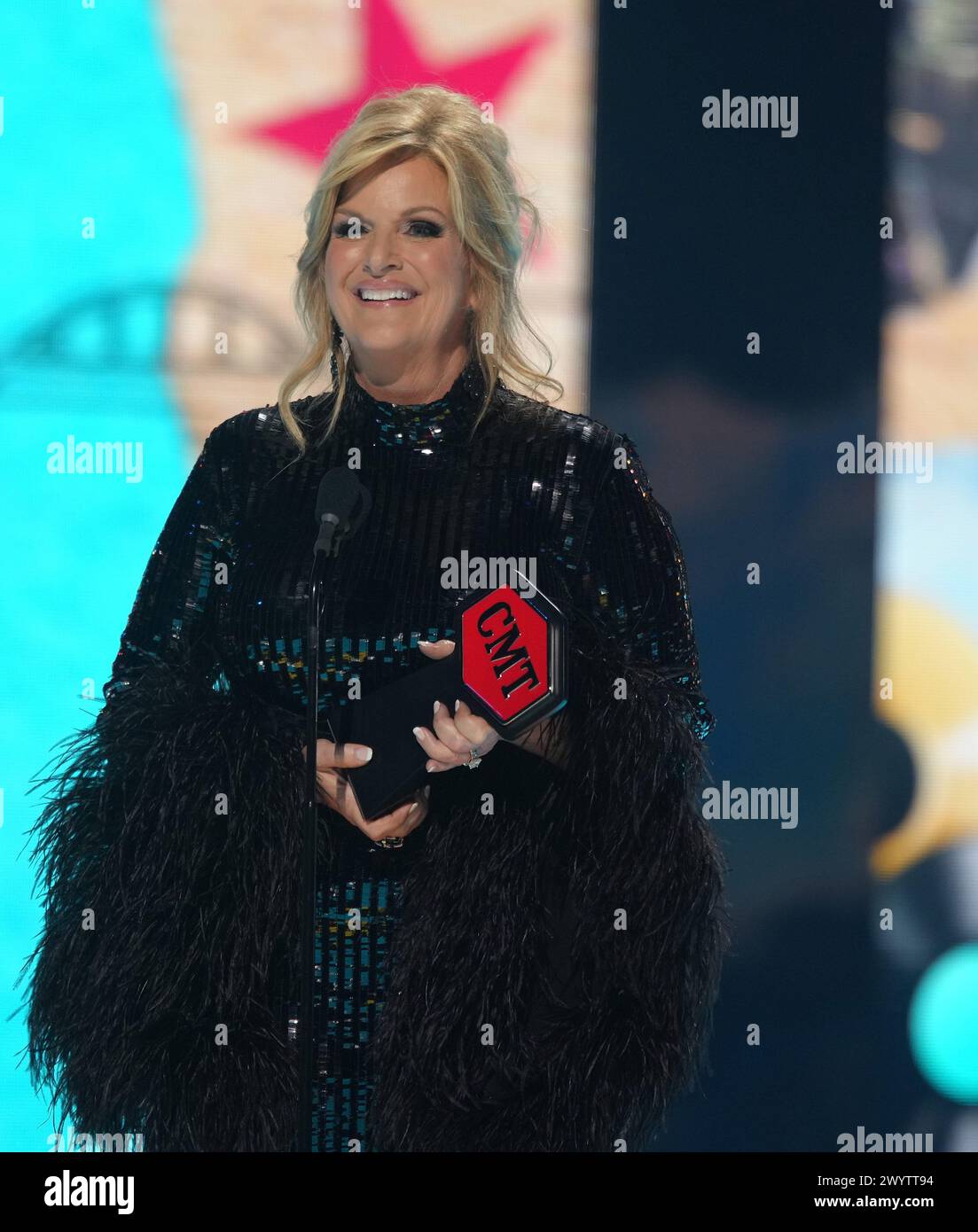 Trisha Yearwood accepts the June Carter Cash Humanitarian Award onstage ...