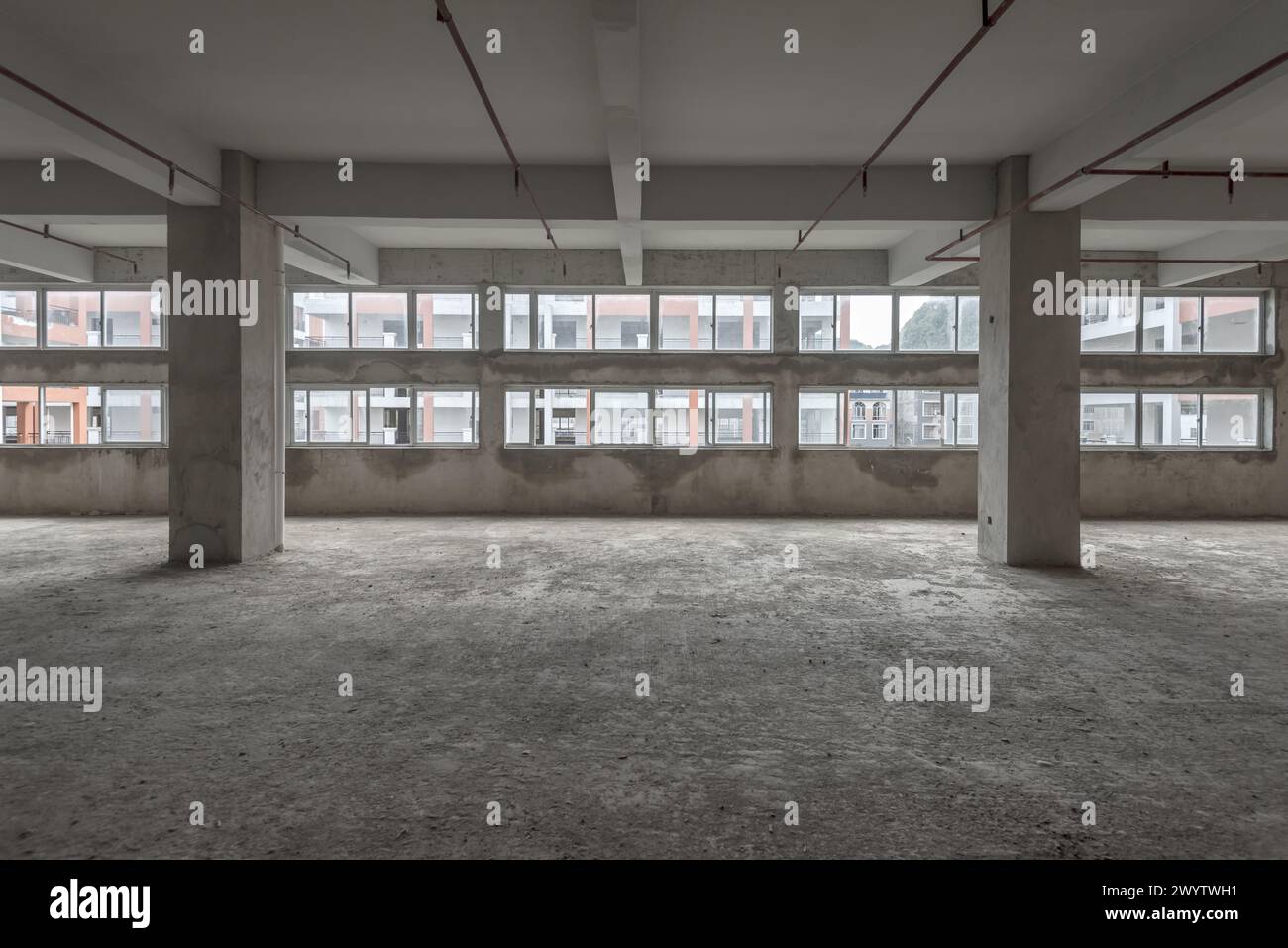 A cement structure inside an unfinished building Stock Photo - Alamy