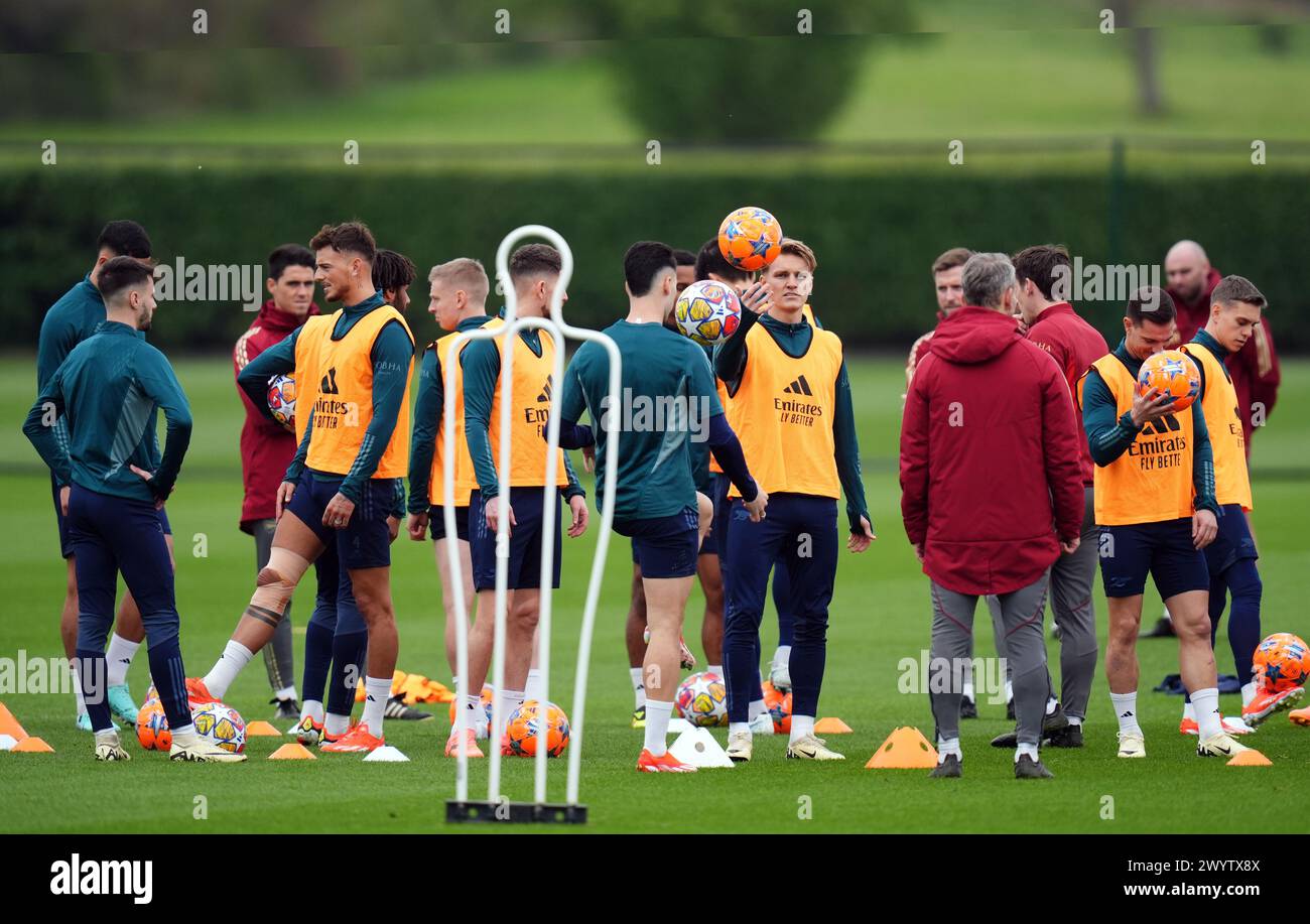 Arsenal's Martin Odegaard (centre) during a training session at the ...