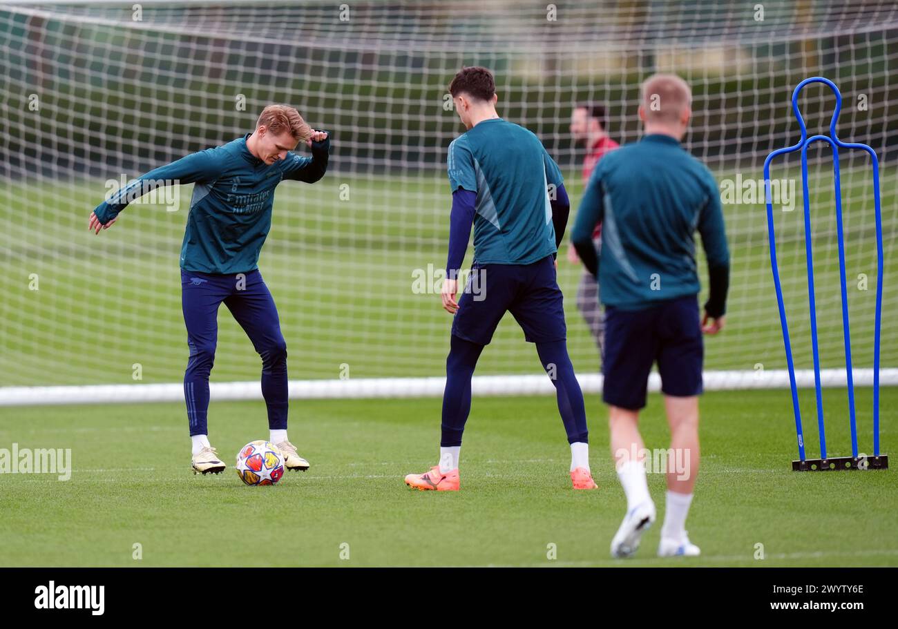 Arsenal's Martin Odegaard (left) during a training session at the Sobha ...
