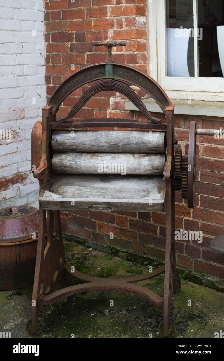Old fashioned cast iron laundry mangle manufactured by T Brooker and ...