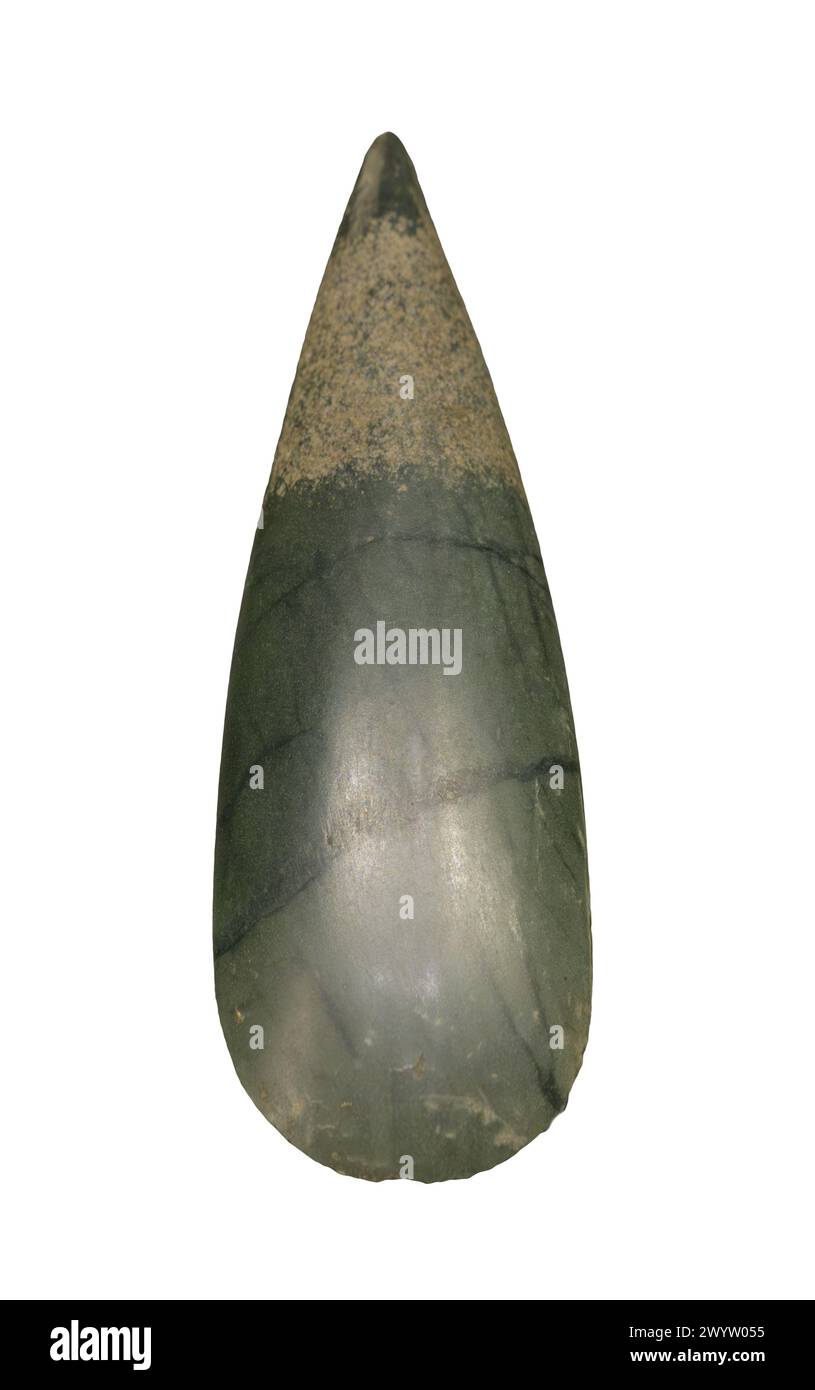 Neolithic polished stone axe, polished jadeite axehead on white ...