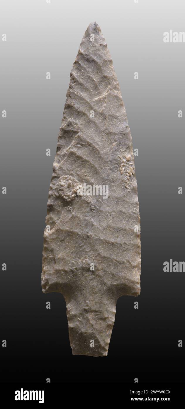 Neolithic flint dagger on black background Stock Photo - Alamy