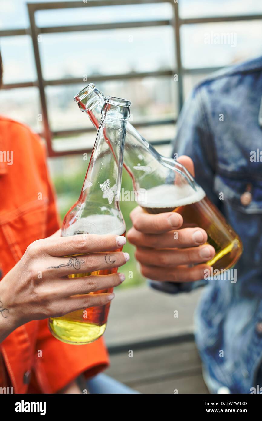 A couple enjoying drinks, engaged in conversation with smiles, sharing ...