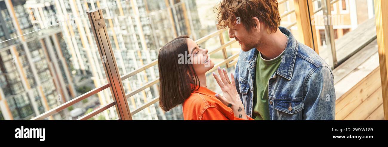 A man and a woman stand side by side, their presence exuding harmony ...