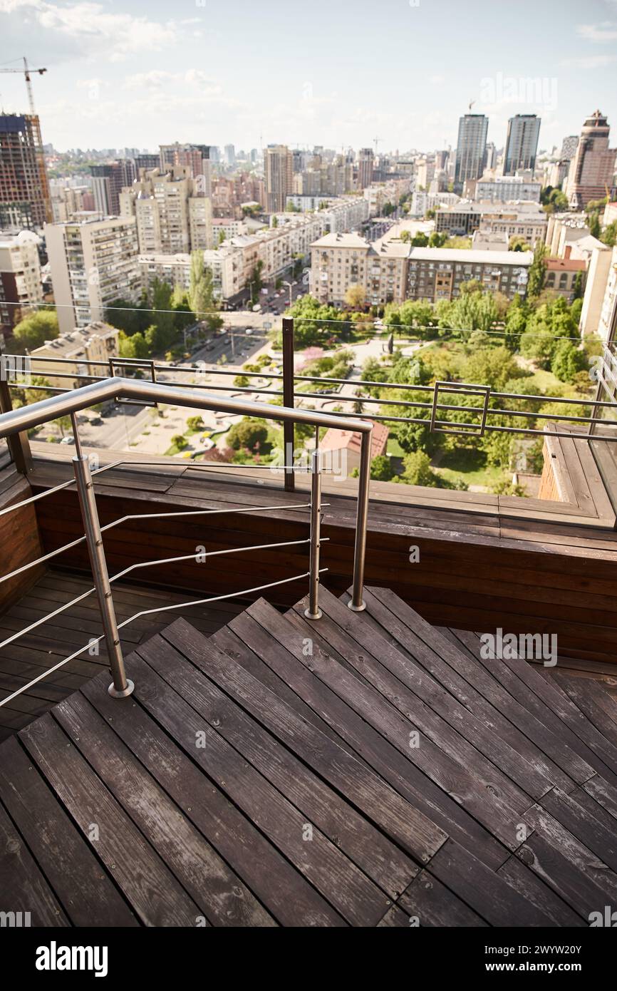 A breathtaking panorama of a bustling cityscape from atop a high-rise ...