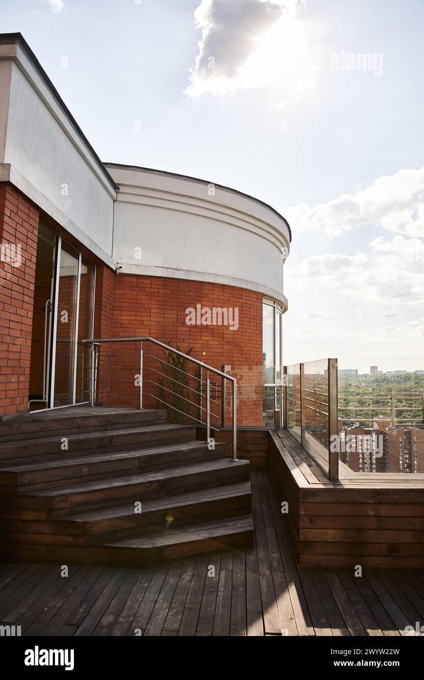 A towering structure adorned with numerous windows and staircases that ...