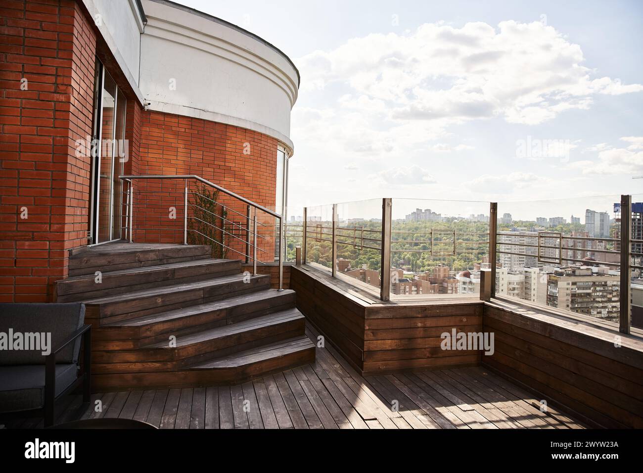 A balcony provides a breathtaking view of the cityscape below ...