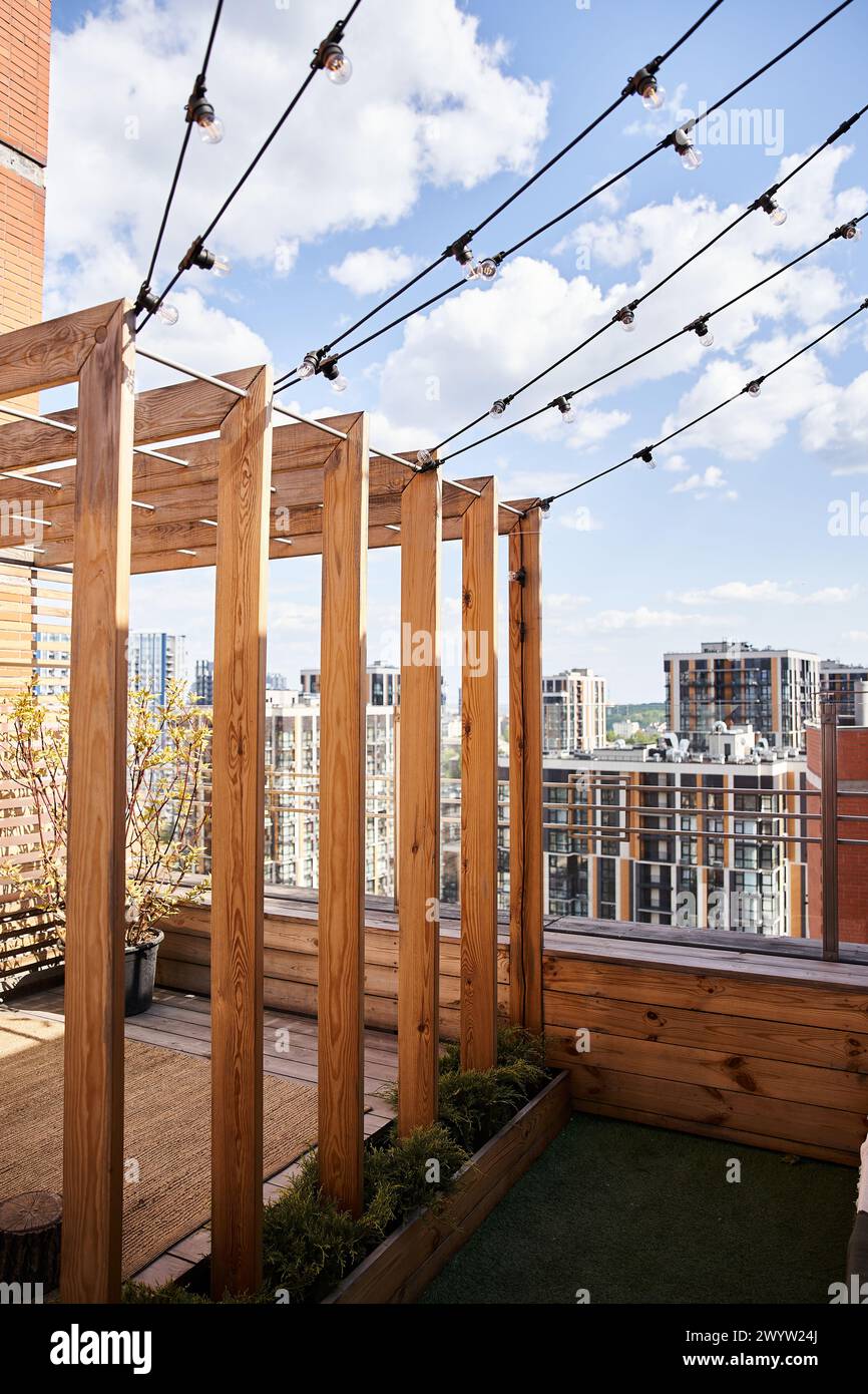 A wooden structure standing on top of a roof, creating a unique and ...