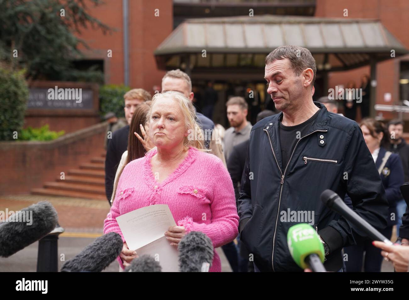 Tracey Fisher (left), mother of Cody Fisher, speaking outside ...