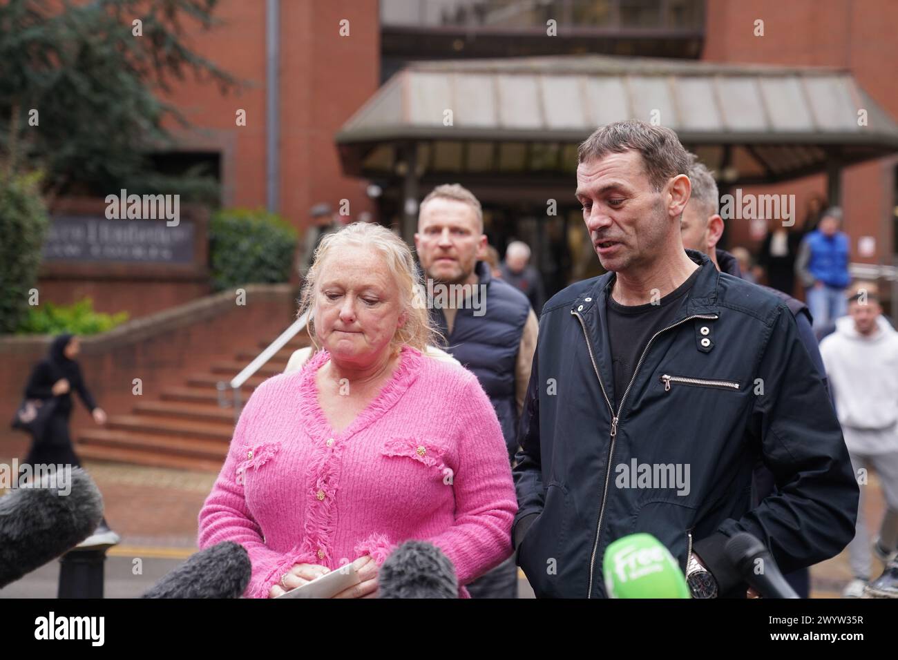 Tracey Fisher (left), mother of Cody Fisher, speaking outside ...