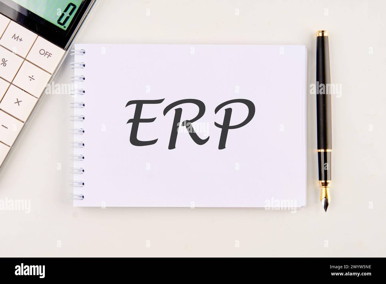 Abbreviation ERP - Enterprise Resource Planning on a white notebook ...