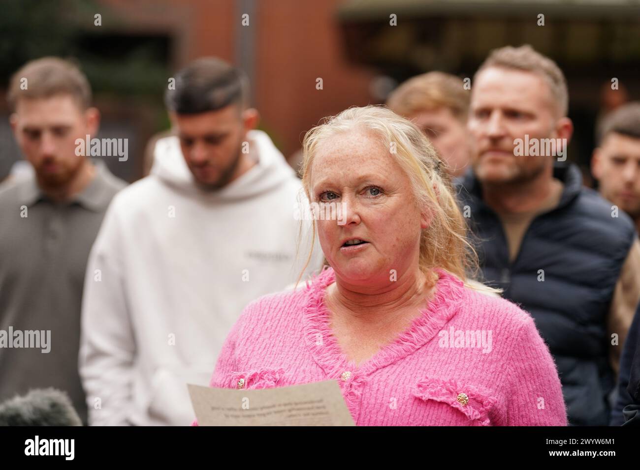 Tracey Fisher (left), mother of Cody Fisher, speaking outside ...