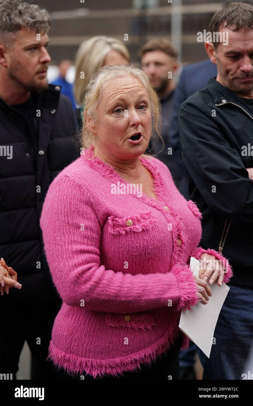 Tracey Fisher (left), mother of Cody Fisher, speaking outside ...