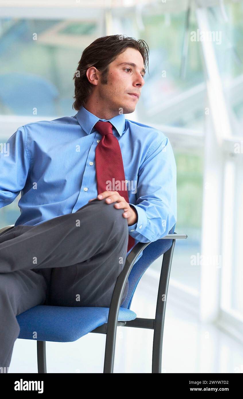 Man legs crossed at knees hi-res stock photography and images - Alamy