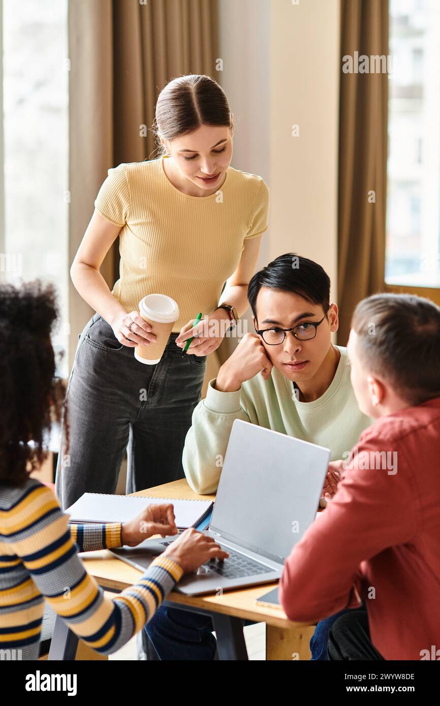 A diverse group of students from different ethnicities and backgrounds ...