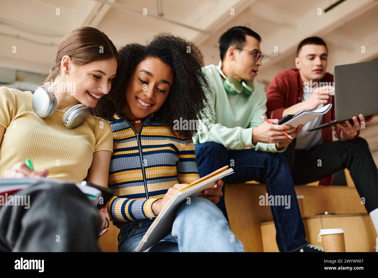 A multicultural group of students engaging in an educational discussion ...