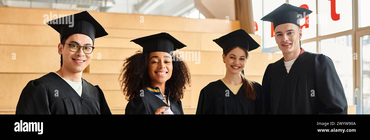 Multicultural group of students in graduation caps and gowns ...