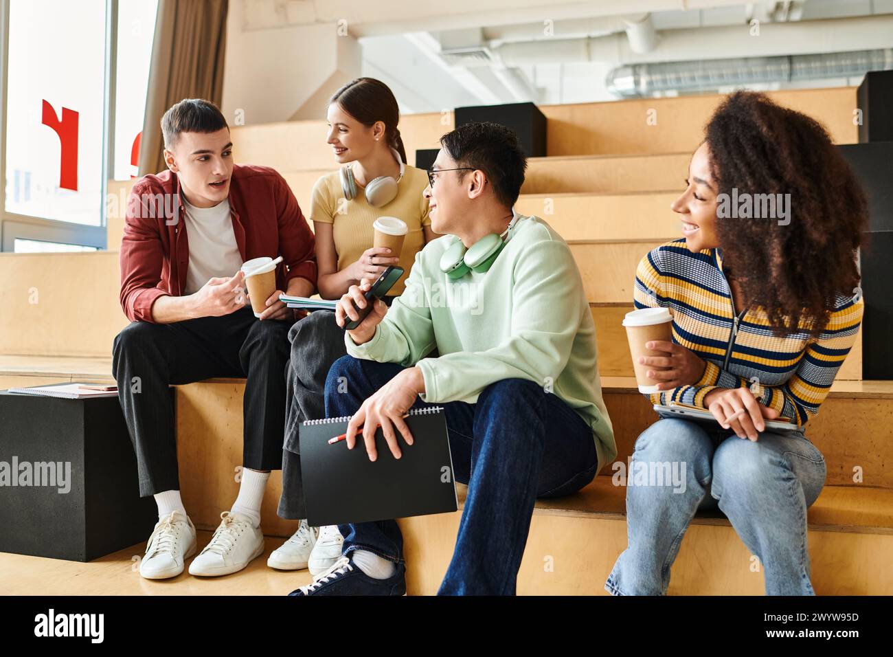 Multicultural students, including African American girl, sitting ...