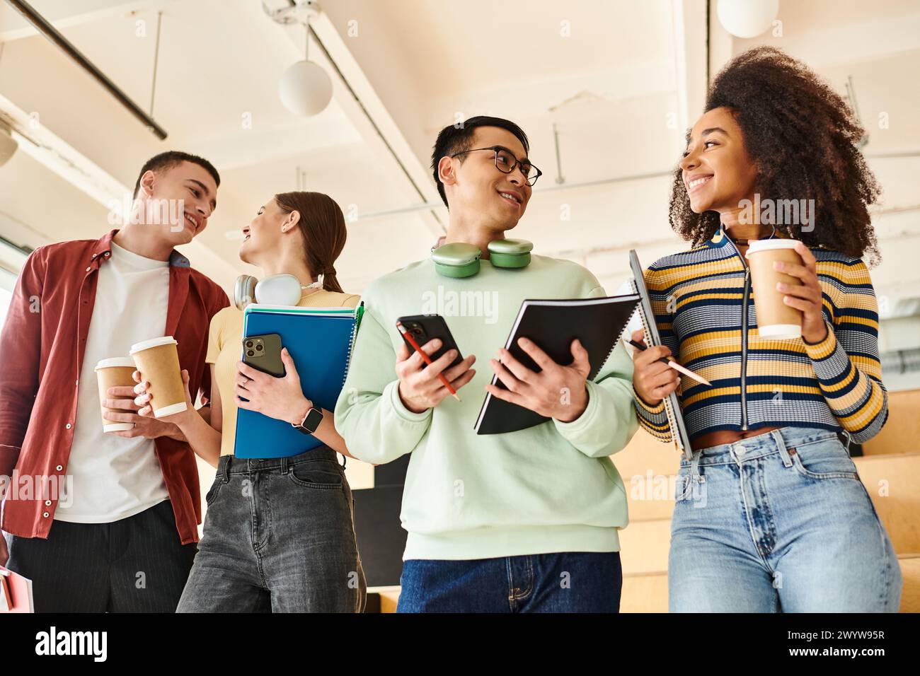 A diverse group of students, including an African American girl ...