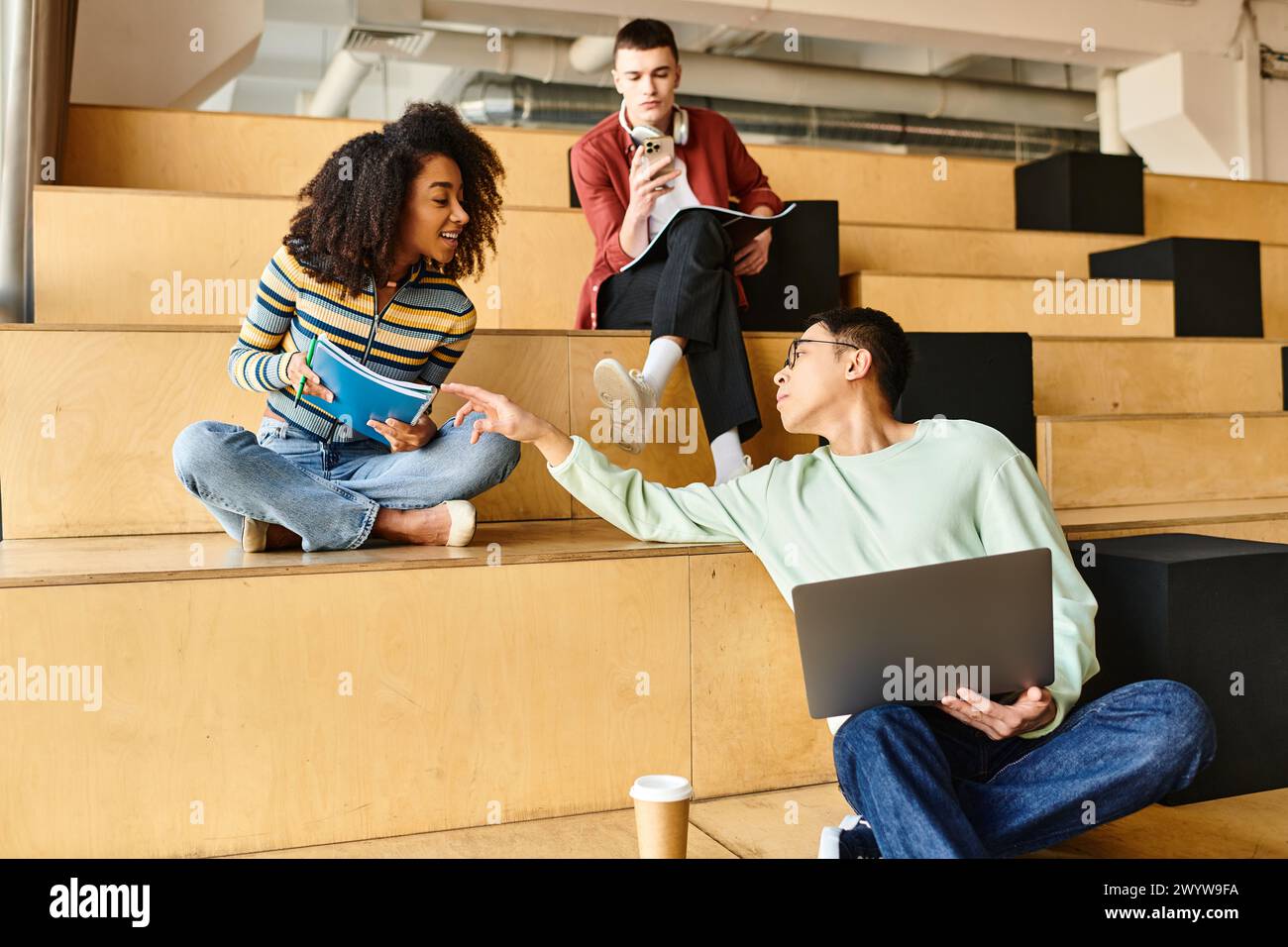 Multicultural students of various backgrounds engaging in conversation ...