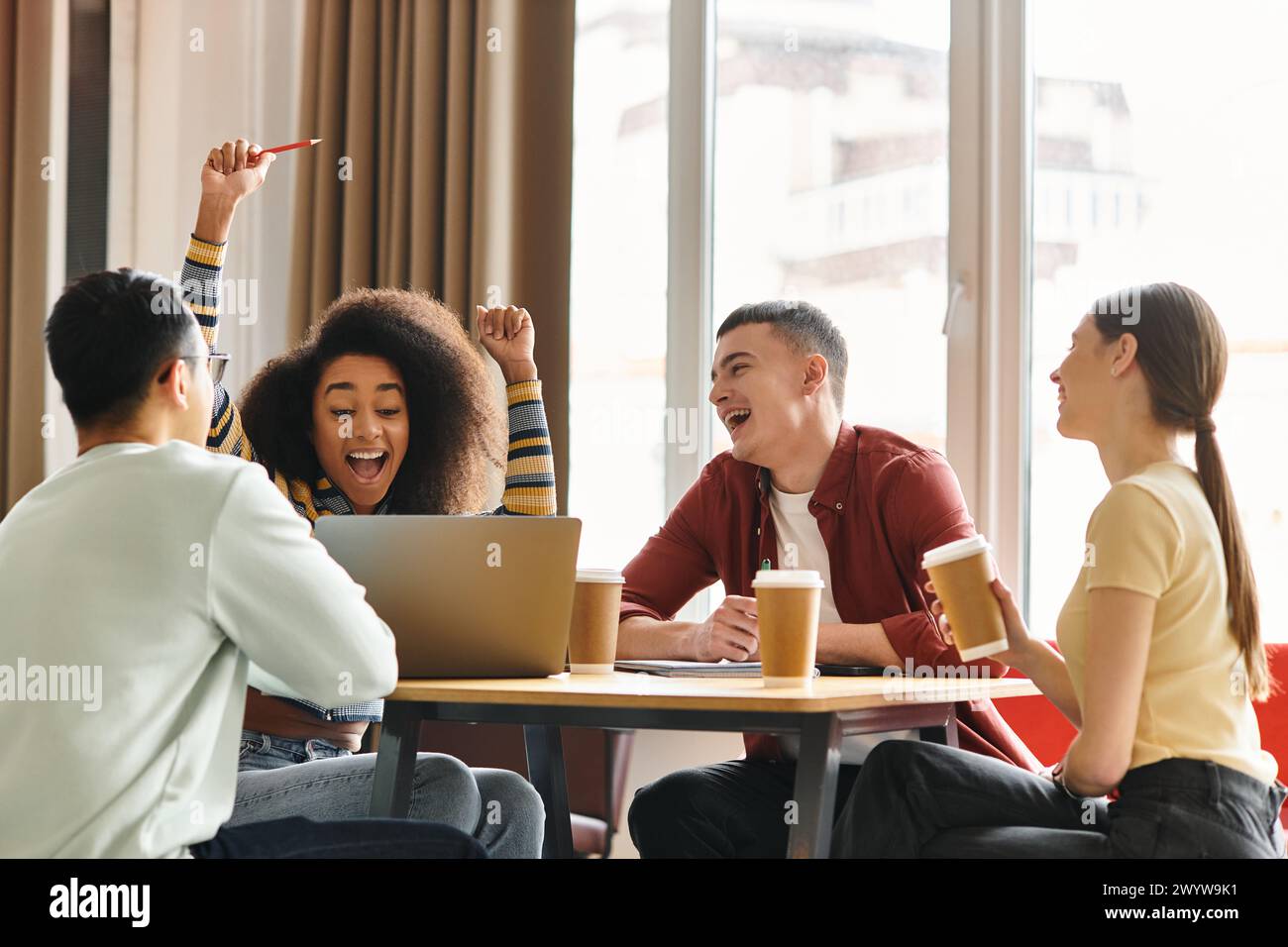 Students working around table at school hi-res stock photography and ...
