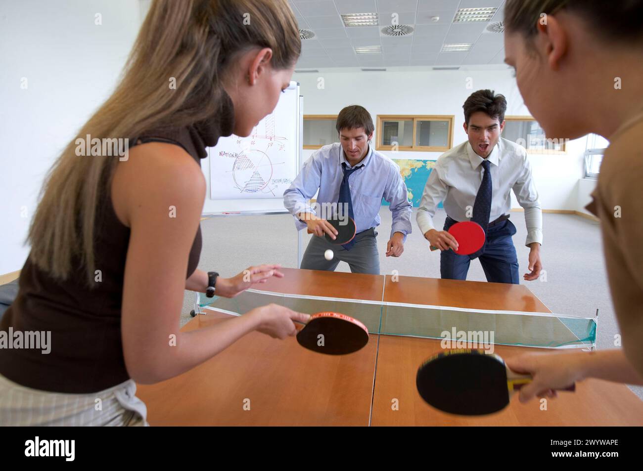Four men playing tennis hi-res stock photography and images - Alamy