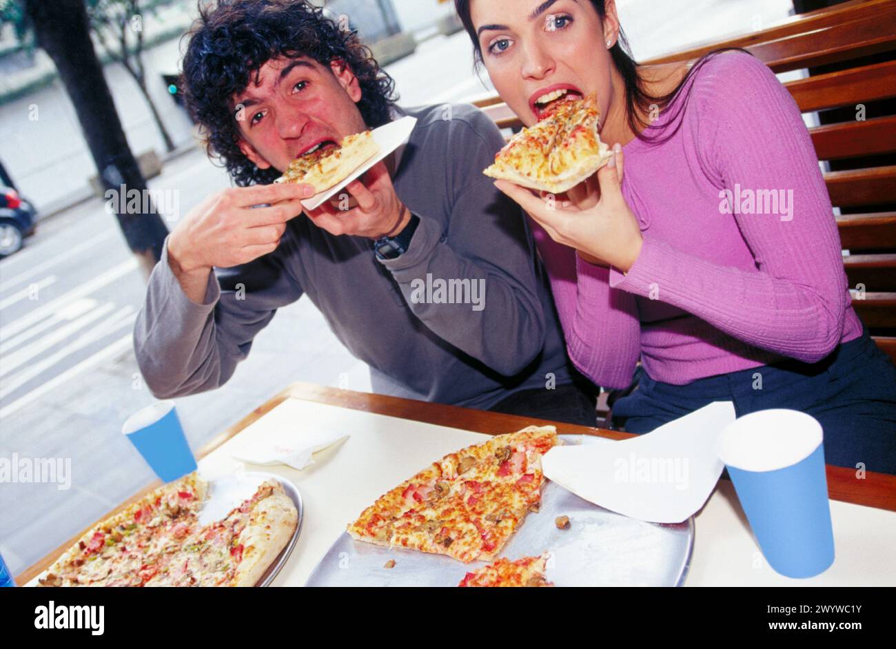 Two boys eating fast food hi-res stock photography and images - Alamy