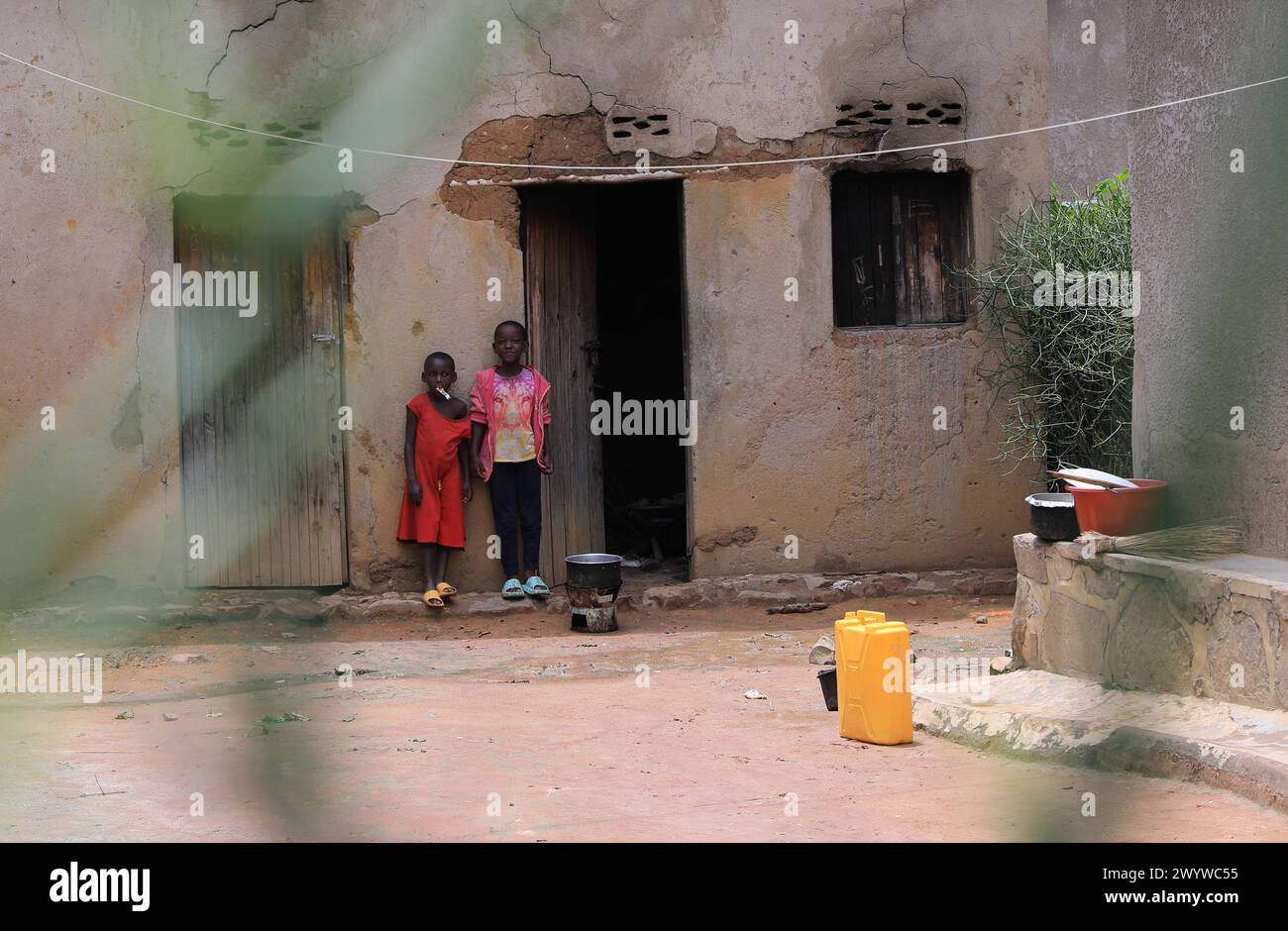 (240408) -- KIGALI, April 8, 2024 (Xinhua) -- Children stand in front ...