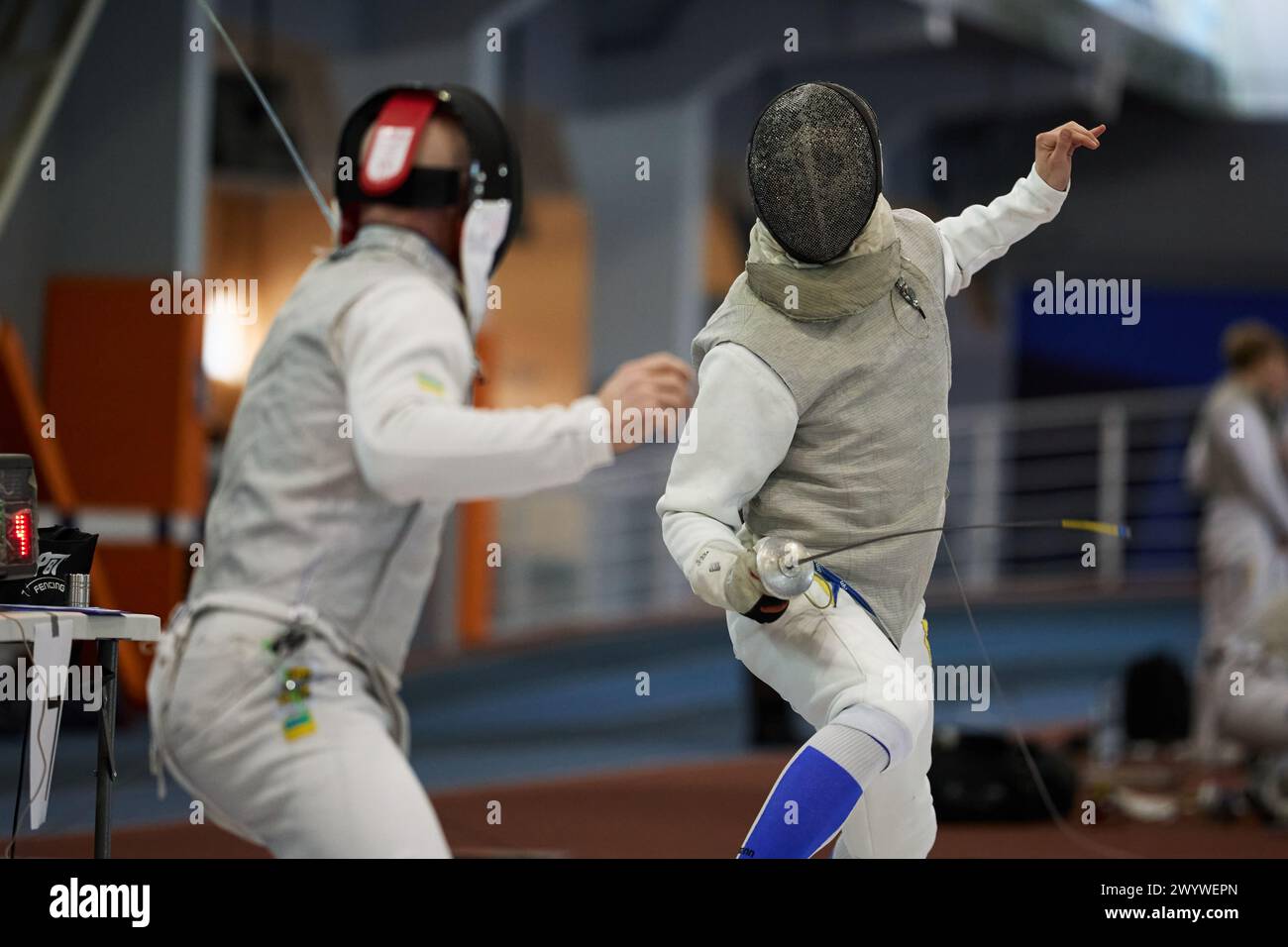 Young Ukrainian fencers fighting with epee blades at National Fencing ...