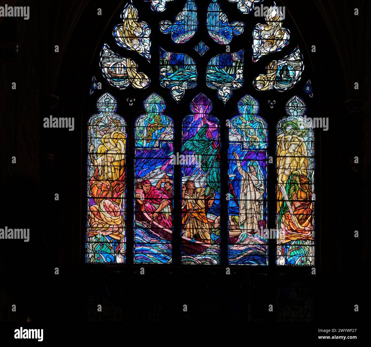 Jesus Christ, in the stern of a boat, and with his terrified disciples ...