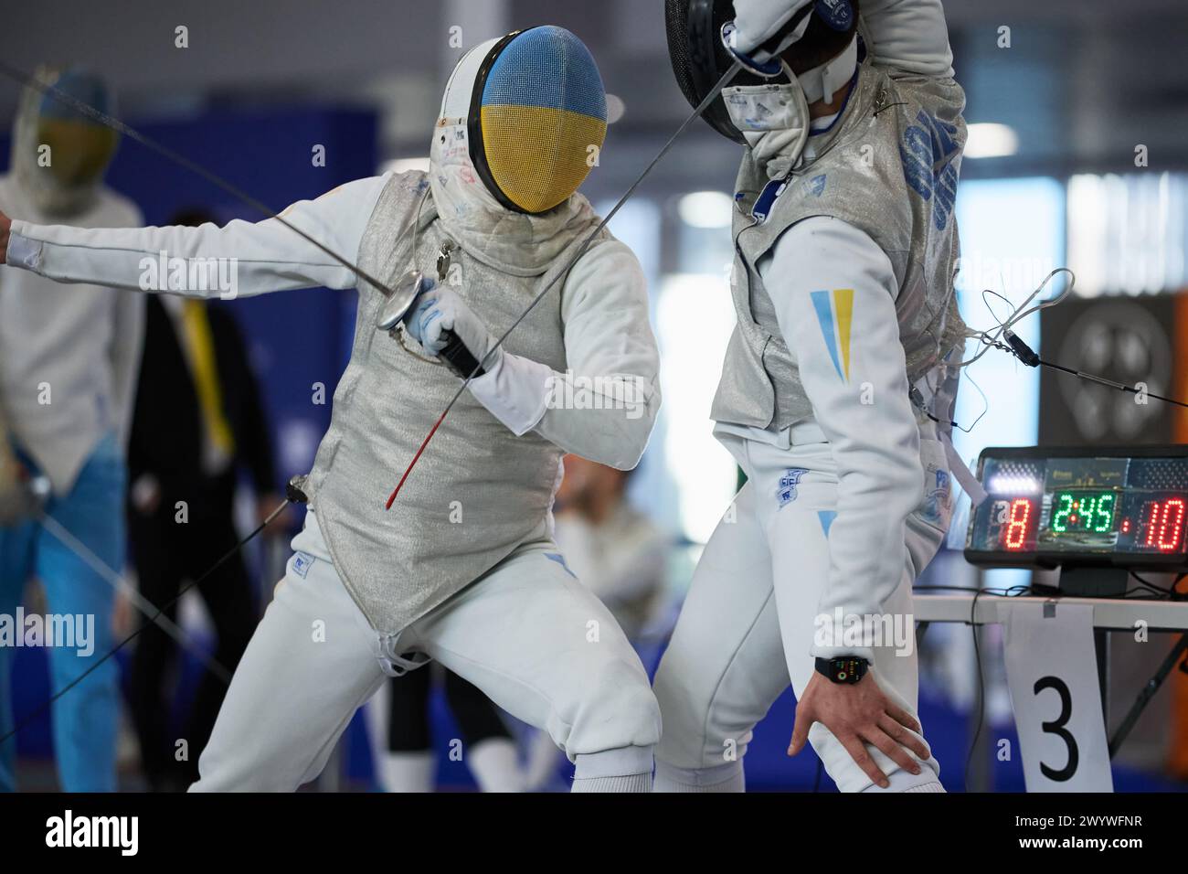 Ukrainian fencers, National Fencing Team Members, fight in close up at ...