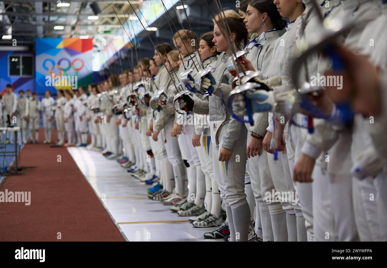 Ukrainian fencers salute with swords at the opening ceremony of the ...