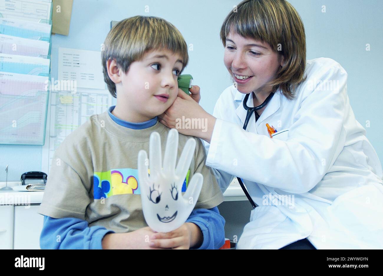 Pediatrician examining year old girl hi-res stock photography and images - Alamy