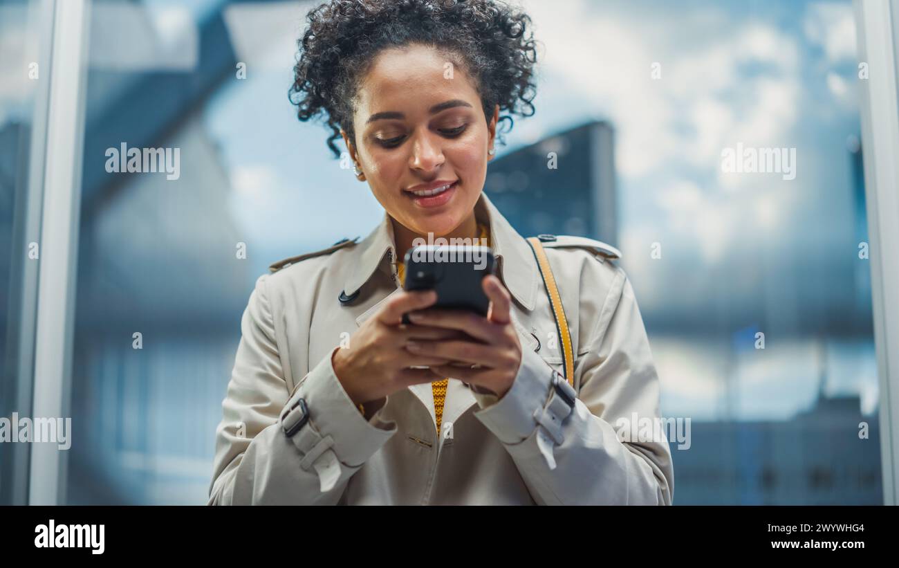 Beautiful Black Female Riding Glass Elevator to Office in Modern ...