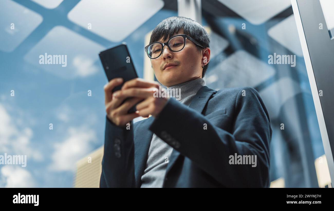 Japanese businessman riding elevator using hi-res stock photography and ...