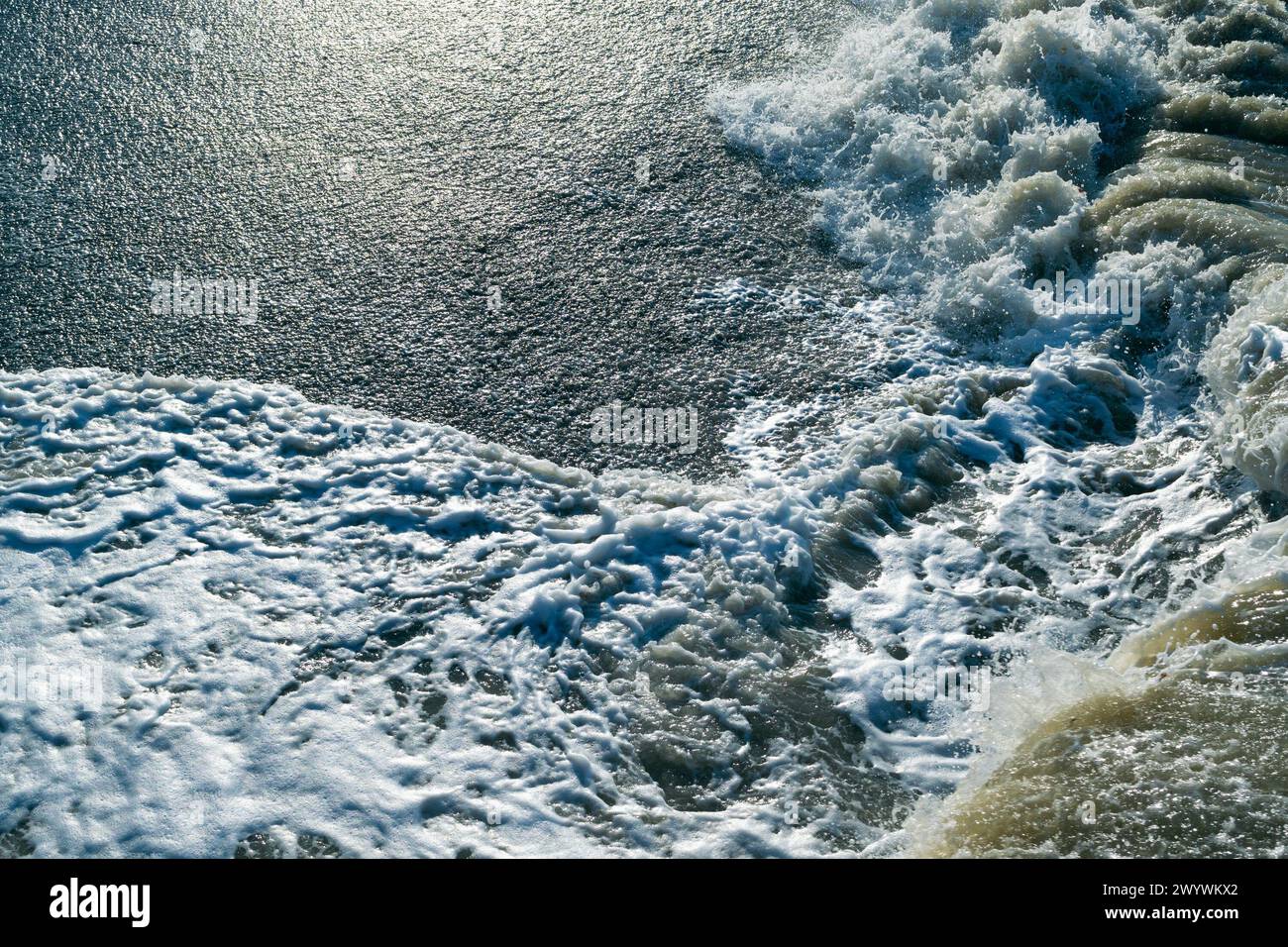 Sea foam on the beach. Sea coast. Marine natural background. Seascape ...