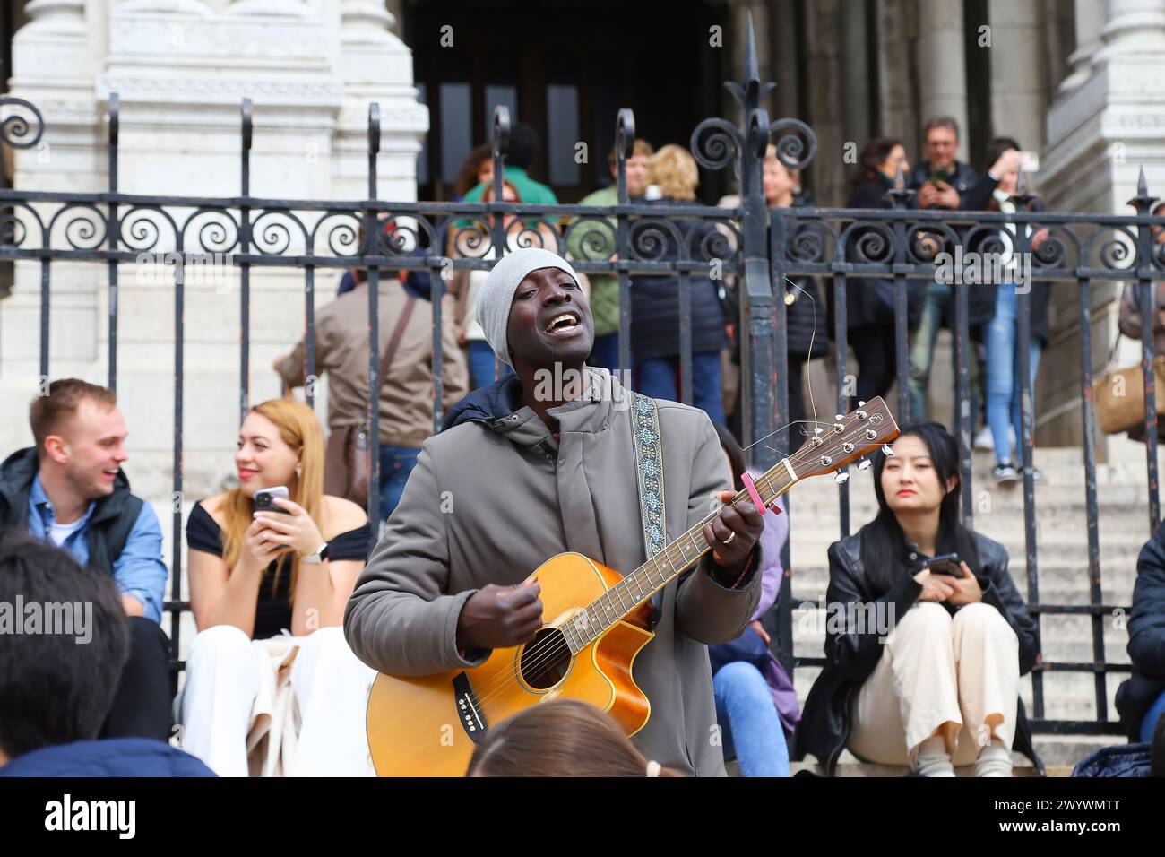 Paris, France -March 31, 2024: Bright performance of street musician in ...