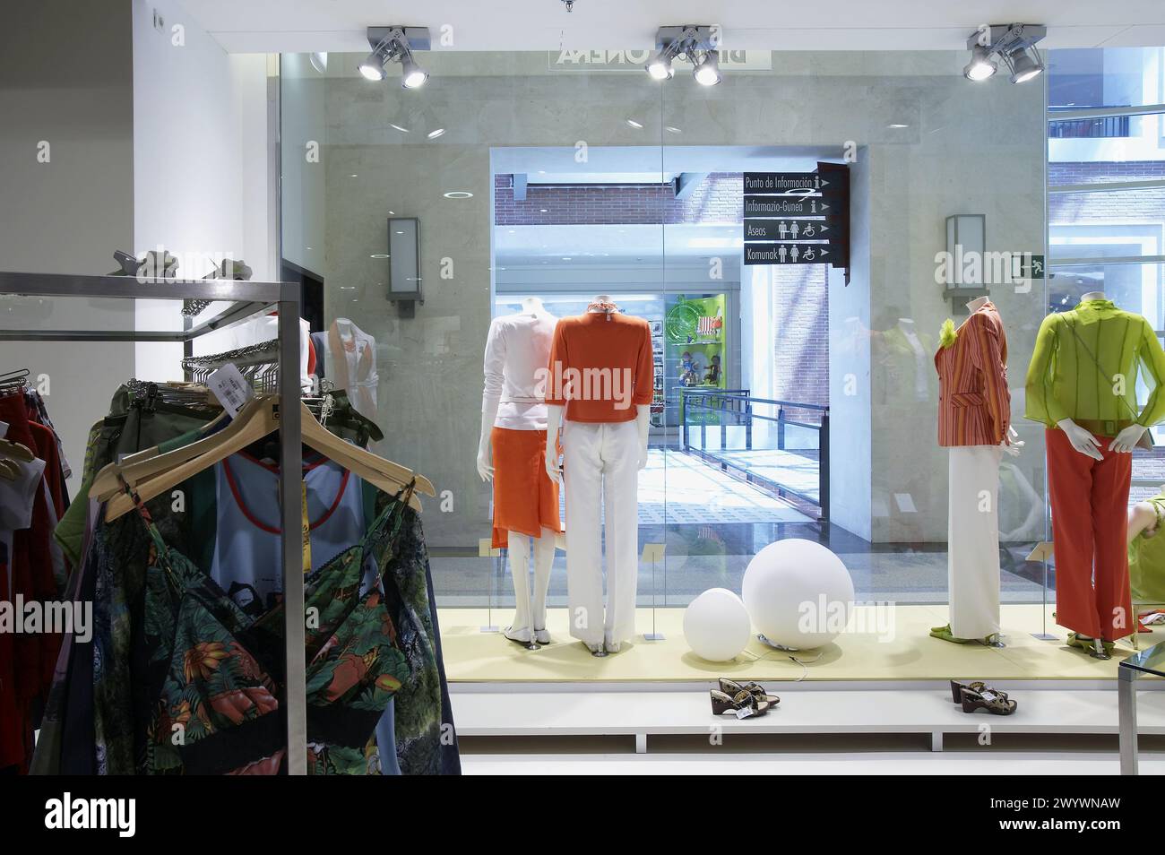 Clothing store windows, shopping mall Stock Photo - Alamy