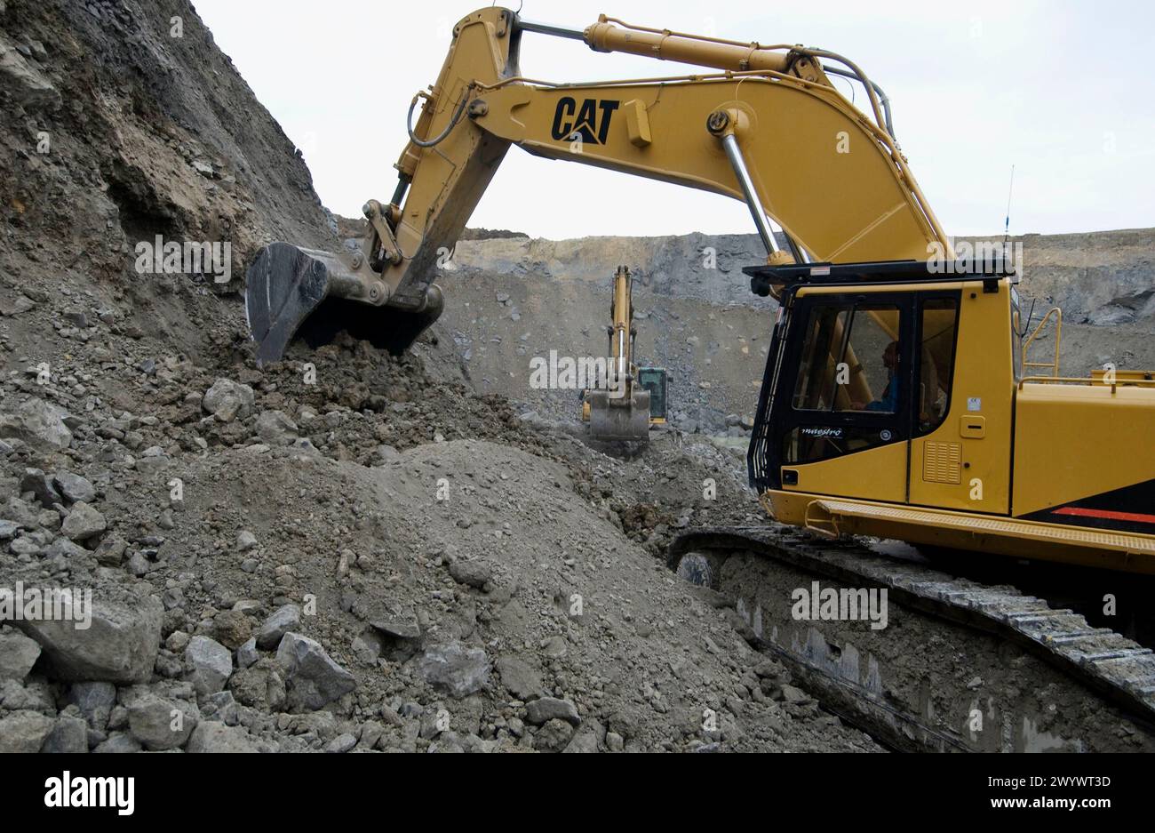 Loading rocks at quarry, Hydraulic Excavator, machinery for public ...