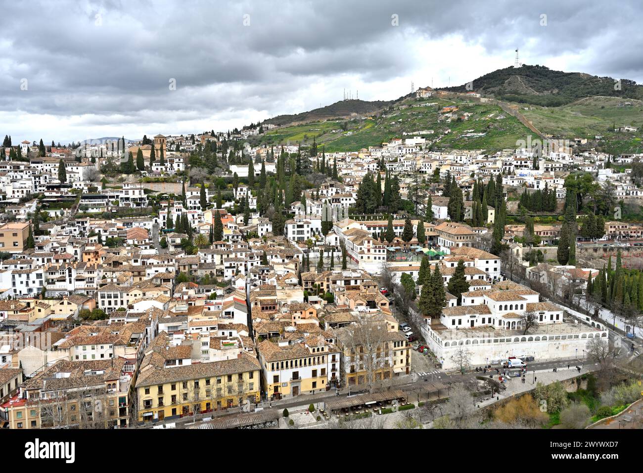 View over rooftops and white houses in northern Granada from the ...