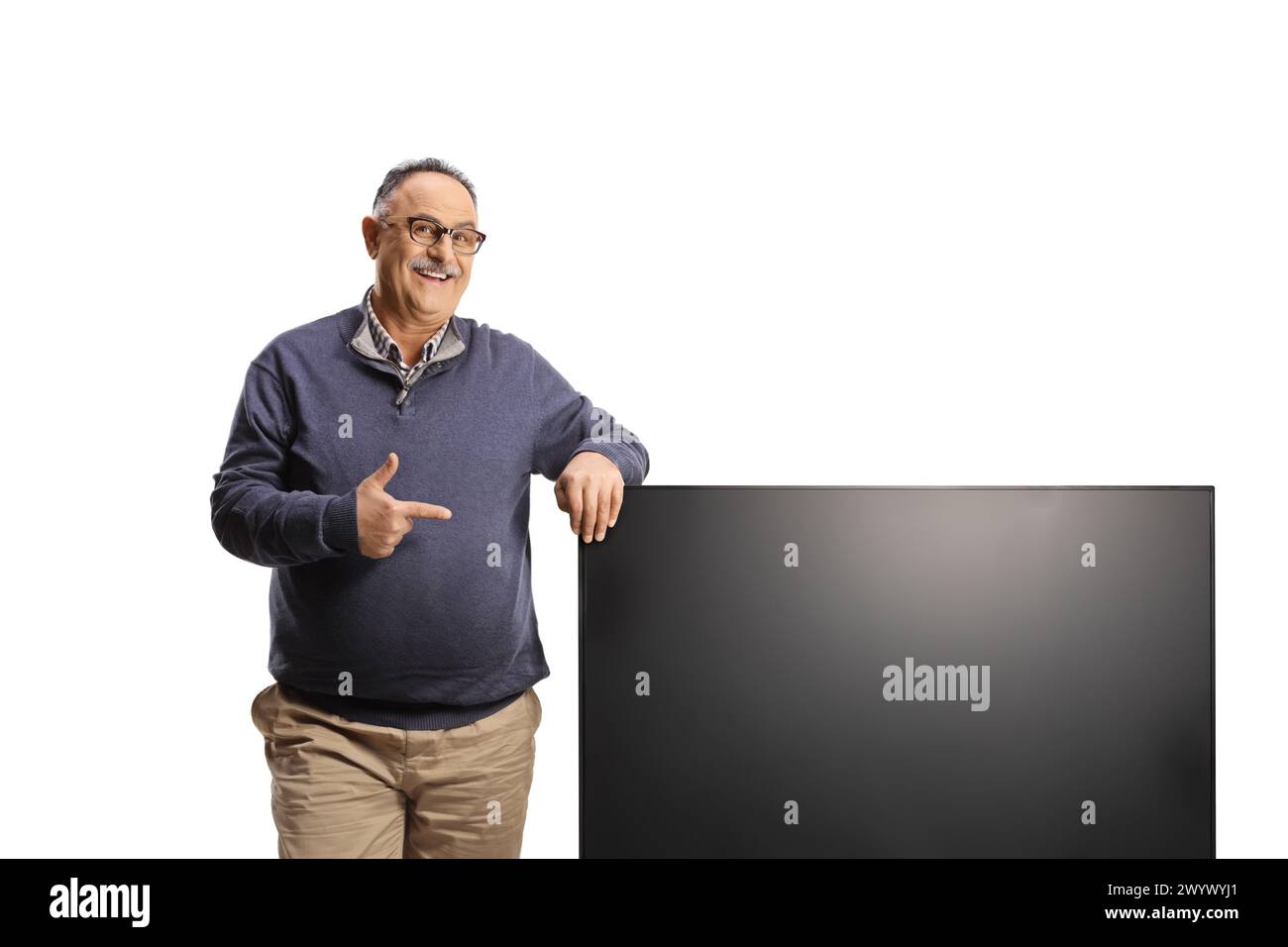 Mature man pointing a tv flat hd screen isolated on white background ...