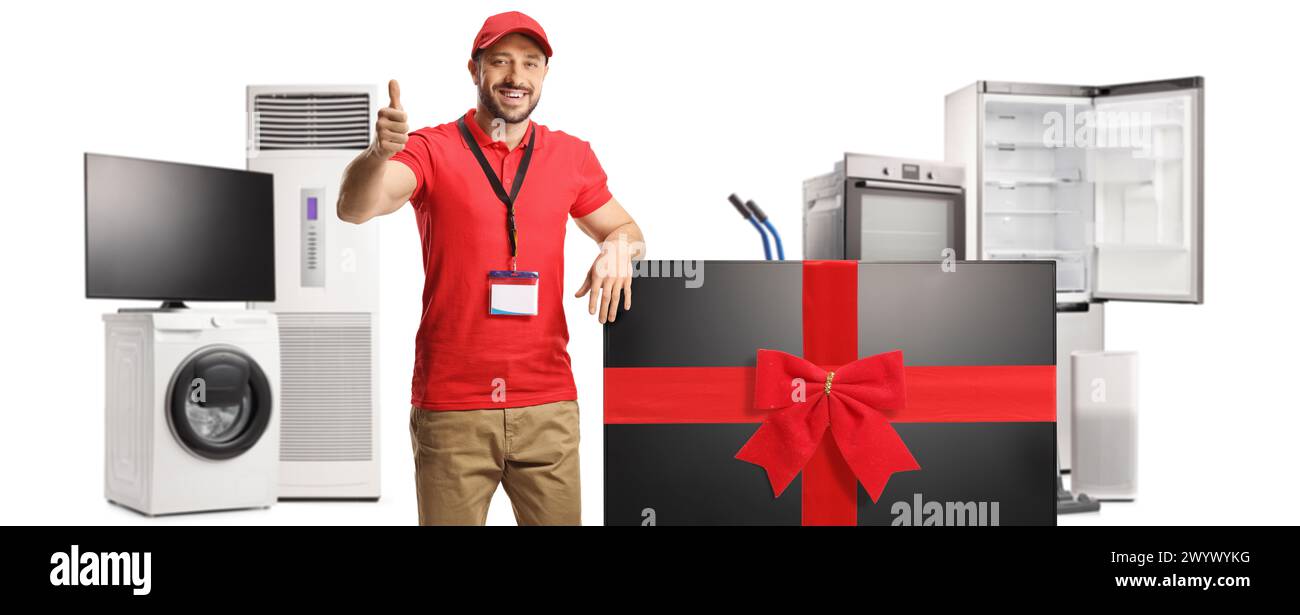 Salesman gesturing thumbs up and leaning on a flat lcd tv screen and ...