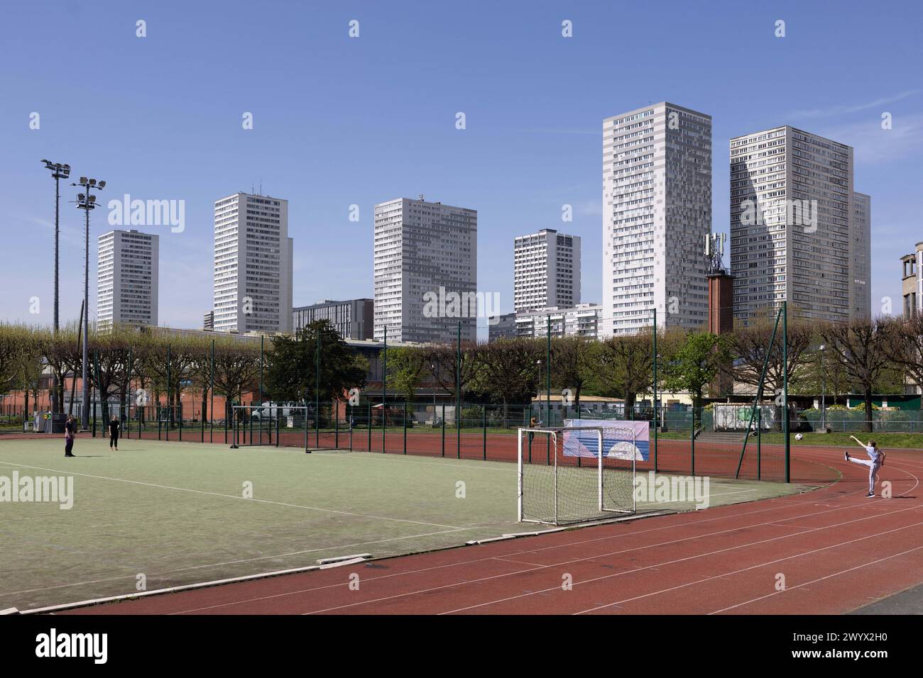 View of a complexe sportive with residential building towers during the ...