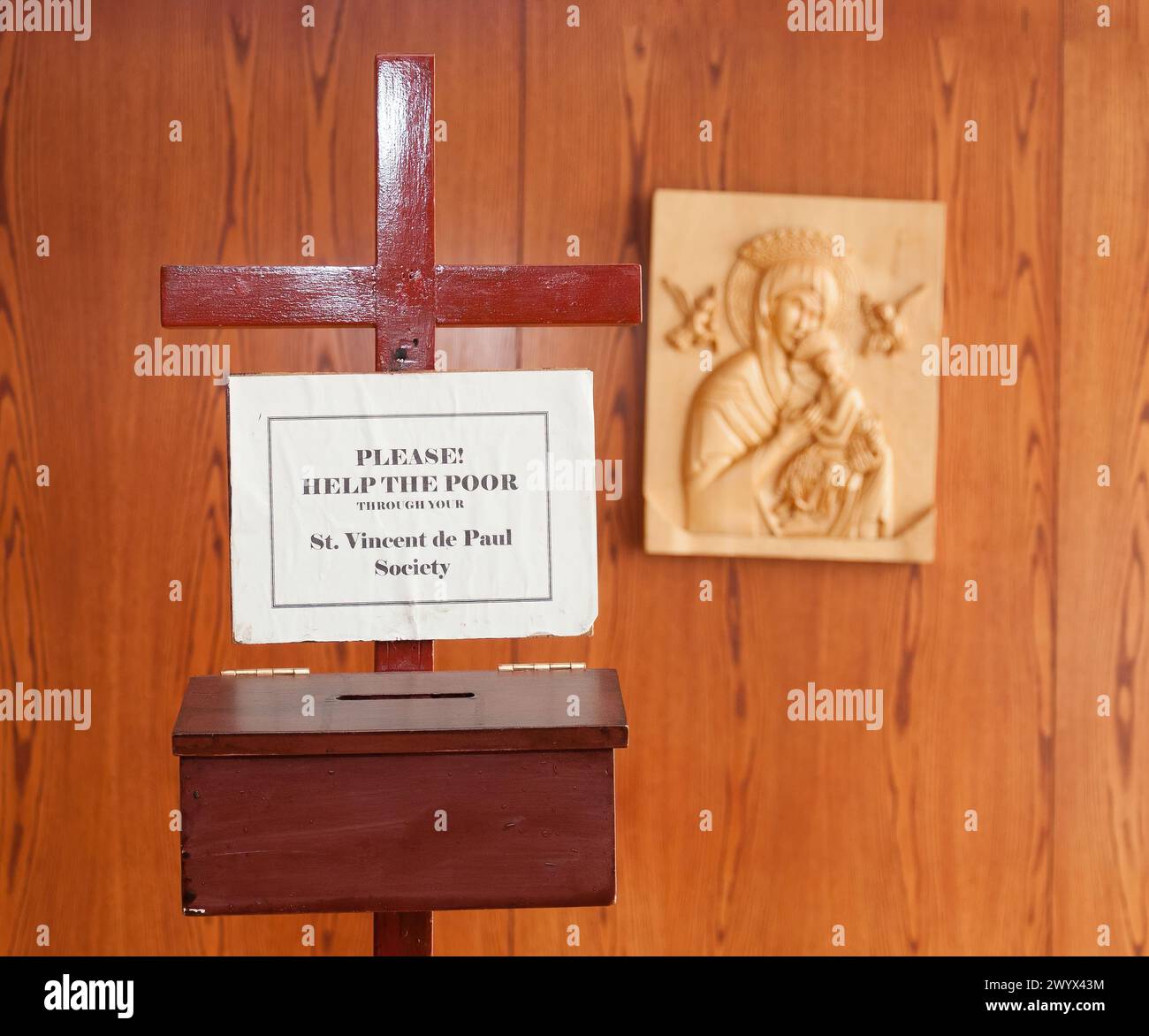 Donation box inside a Catholic church Stock Photo - Alamy
