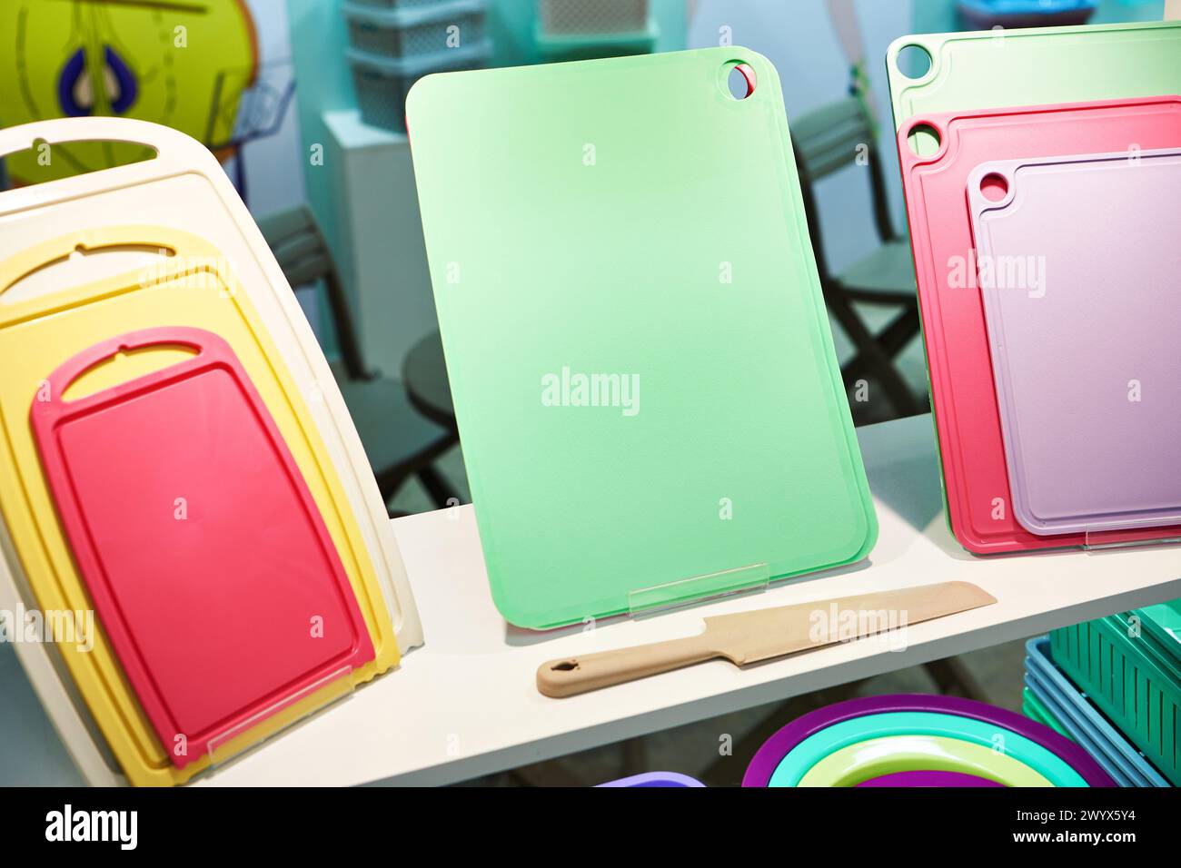Colorful plastic cutting boards in the store Stock Photo - Alamy