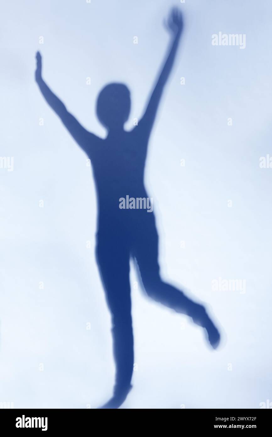 Silhouette woman raising arms in hi-res stock photography and images ...